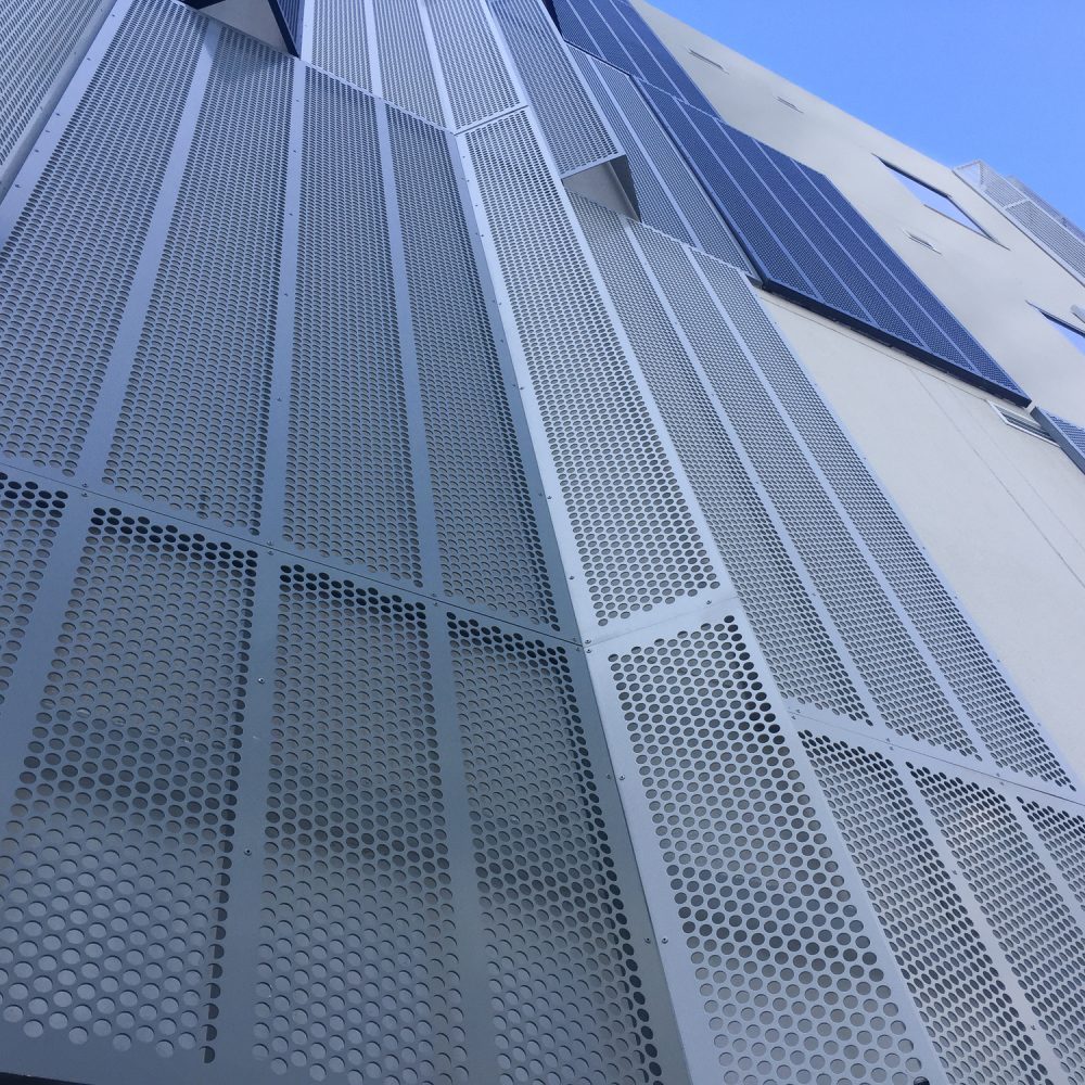 Metal Shutter Facade: Infinity Apartments - Arrow Metal