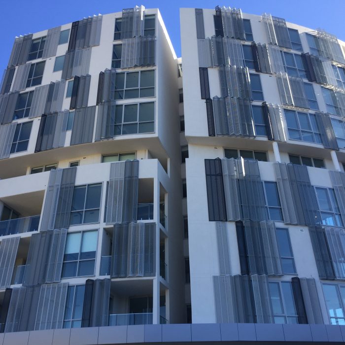 Perforated Metal Facade Guide: Design tips & considerations - Arrow Metal